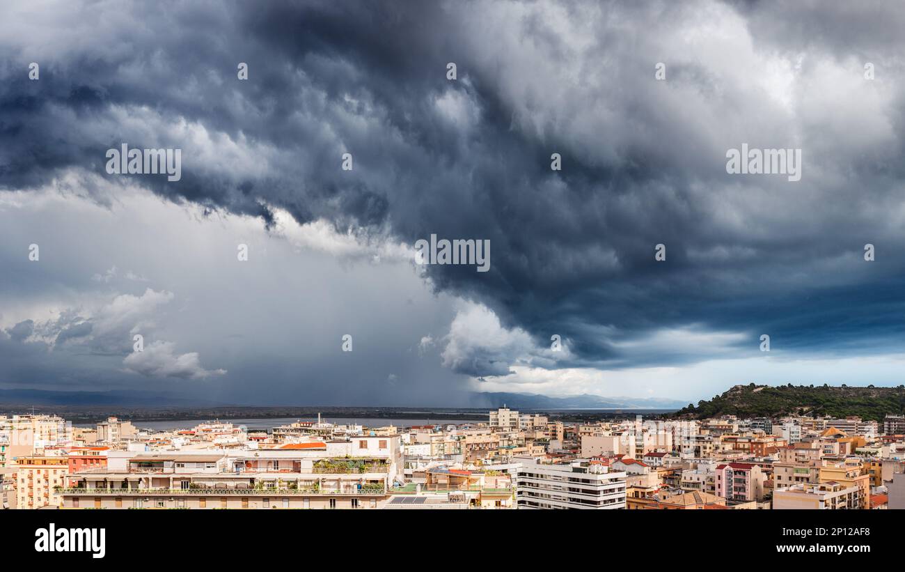 Downburst over Cagliari city. Heavy rain over the city, extreme whether ...