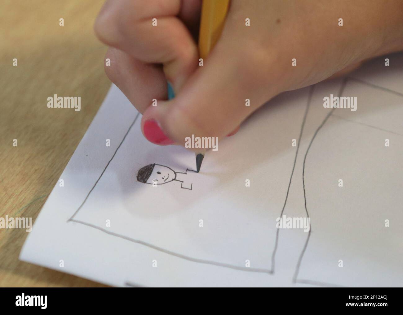 Children learn how to create comic strips during a comic book and ...