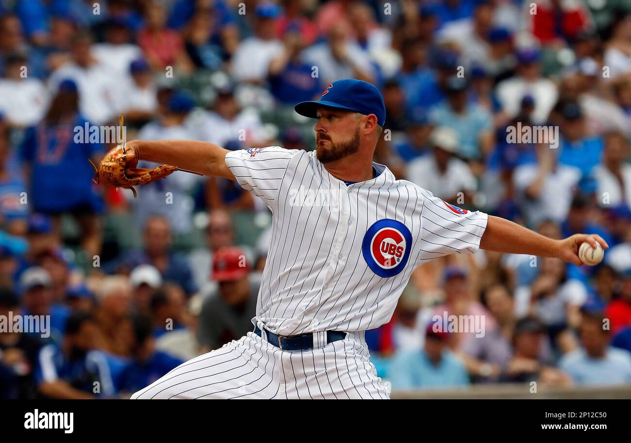 Chicago Cubs relief pitcher Travis Wood delivers to a St. Louis ...