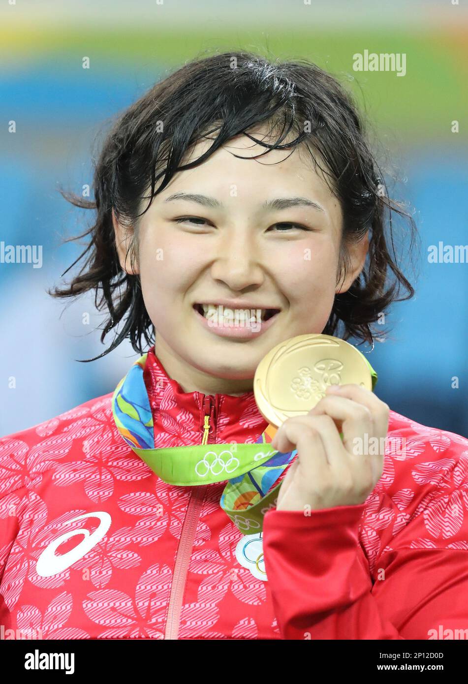 Japan's wrestler Sara Dosho smiles with the gold medal during the ...
