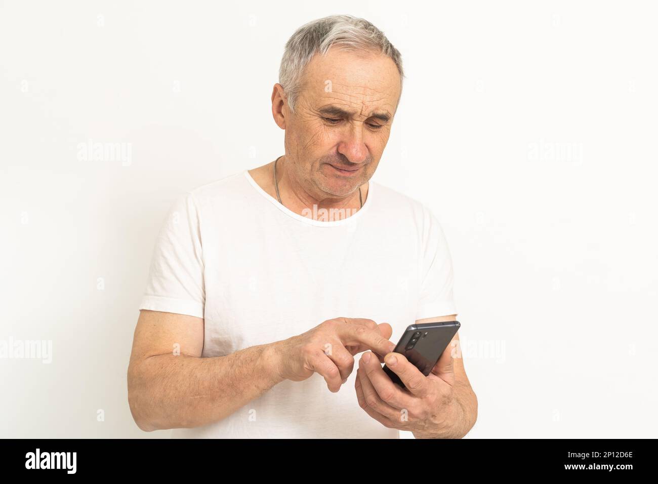 older mature retired man feeling upset desperate talking on the phone ...