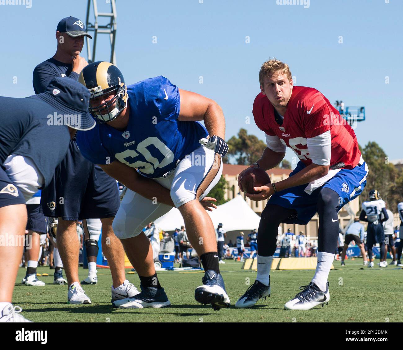 Los Angeles Rams quarterback Jared Goff, right, works on exchanges with ...