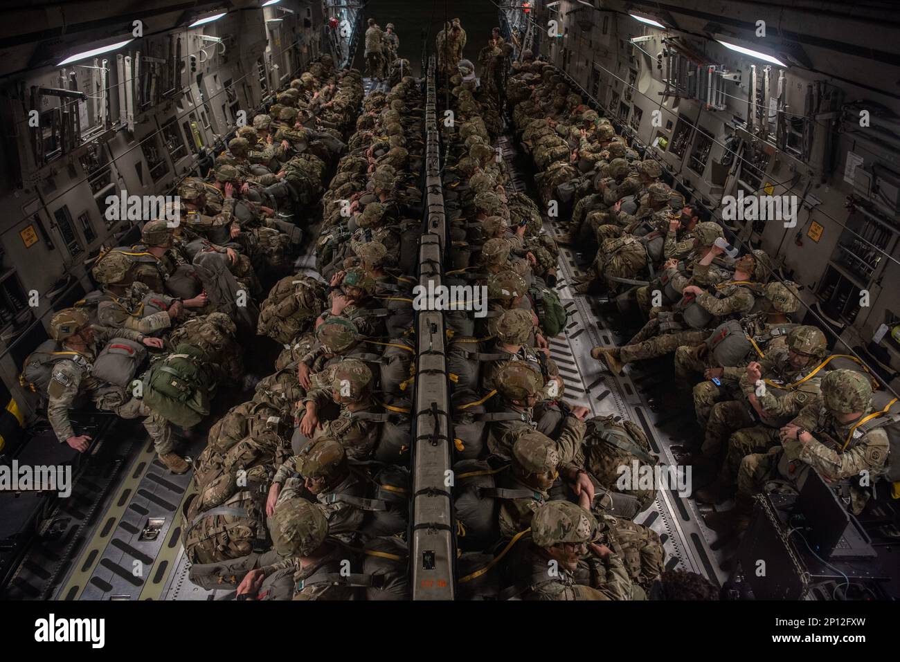 U.S. Army Soldiers from the 82nd Airborne Division prepare to enter a C ...