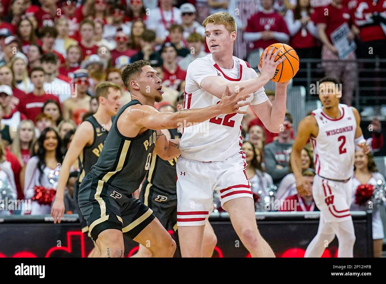 Wisconsin's Steven Crowl (22) and Purdue's Mason Gillis (0) during the ...