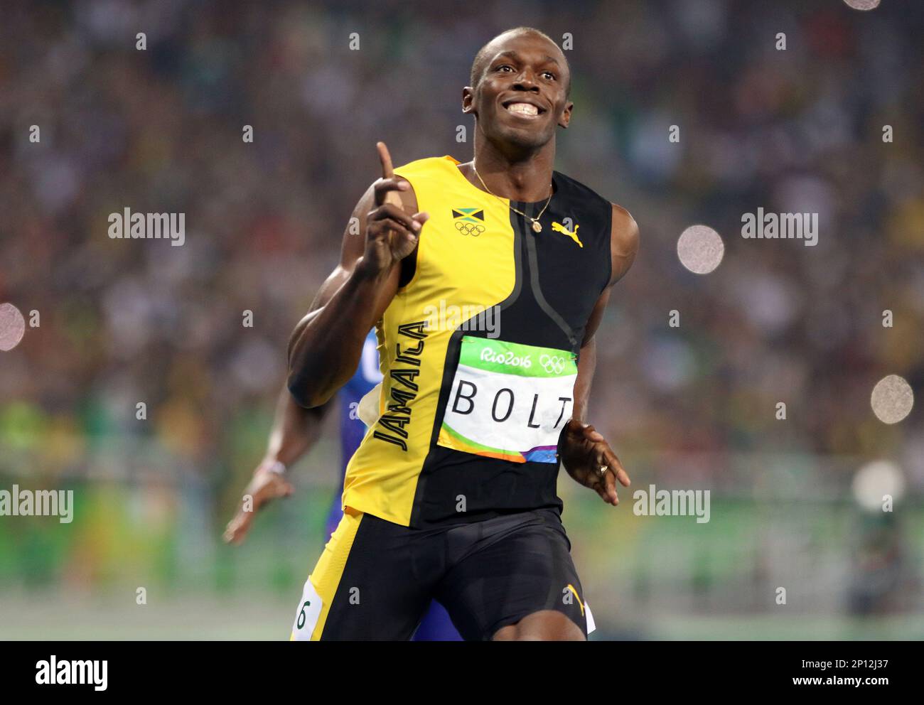 Usain Bolt celebrates winning the 100 meter race during the men's final ...