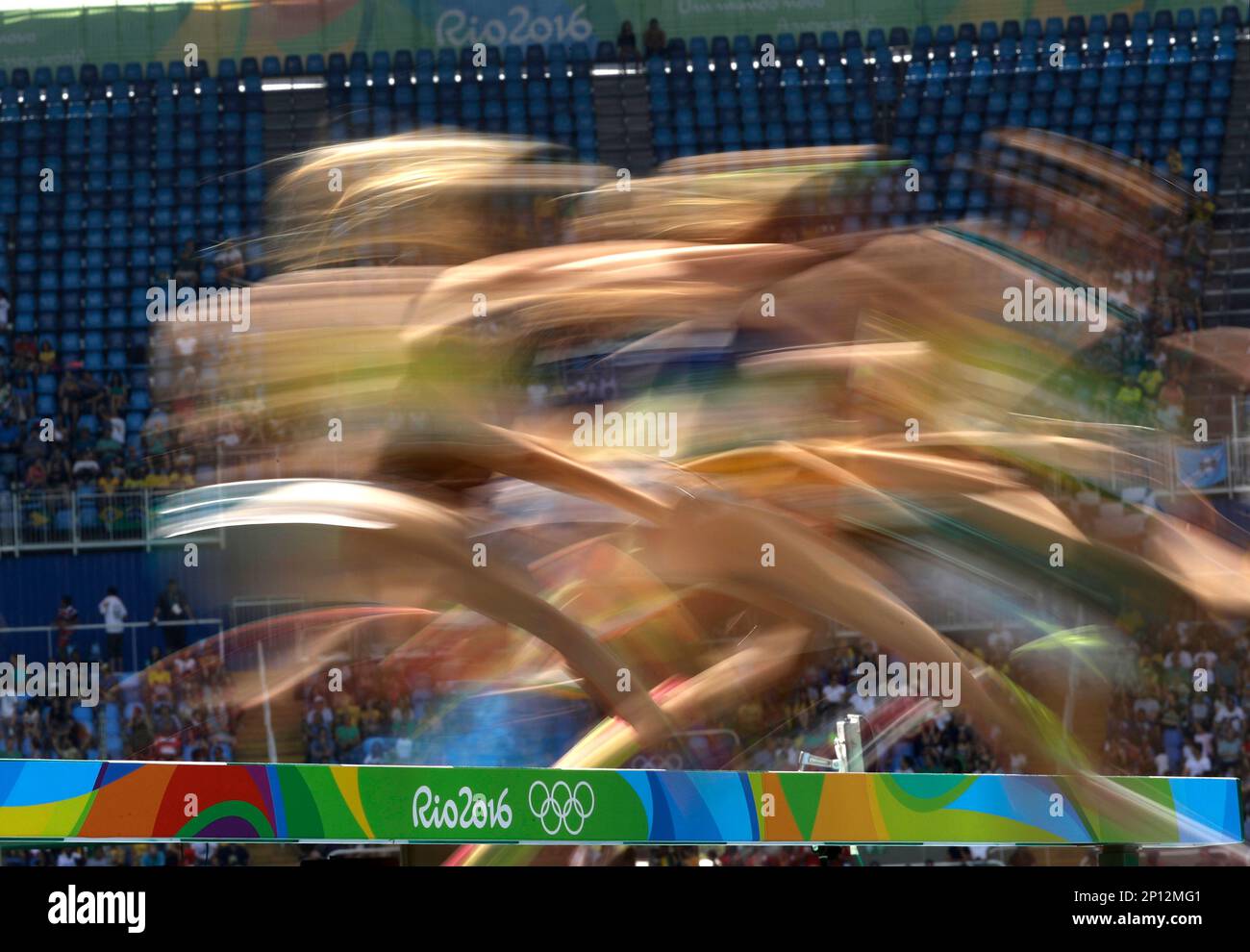 Athletes compete in the women's 3000-meter steeplechase final during ...