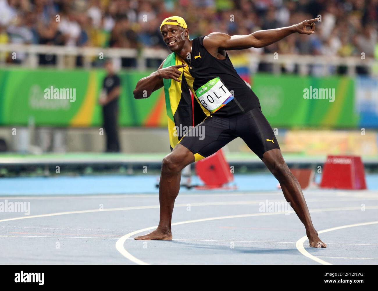Usain Bolt celebrates winning the 100 meter race during the men's final ...