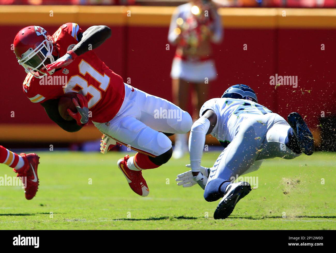 Kansas City Chiefs wide receiver Tyreek Hill (81) topples after a ...