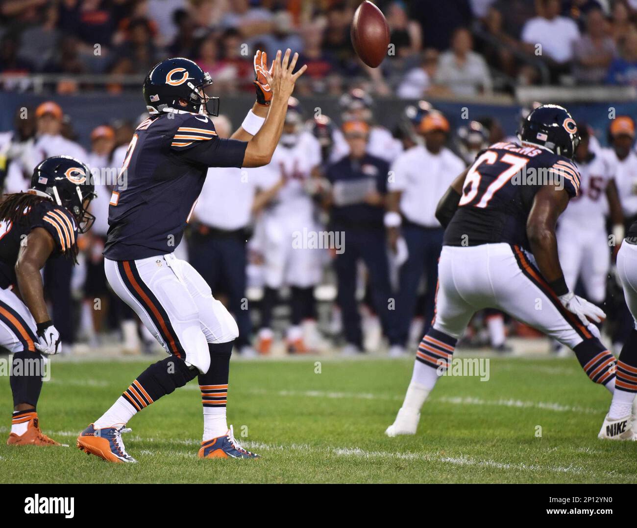 Chicago Bears quarterback Brian Hoyer reaches for a high snap from ...