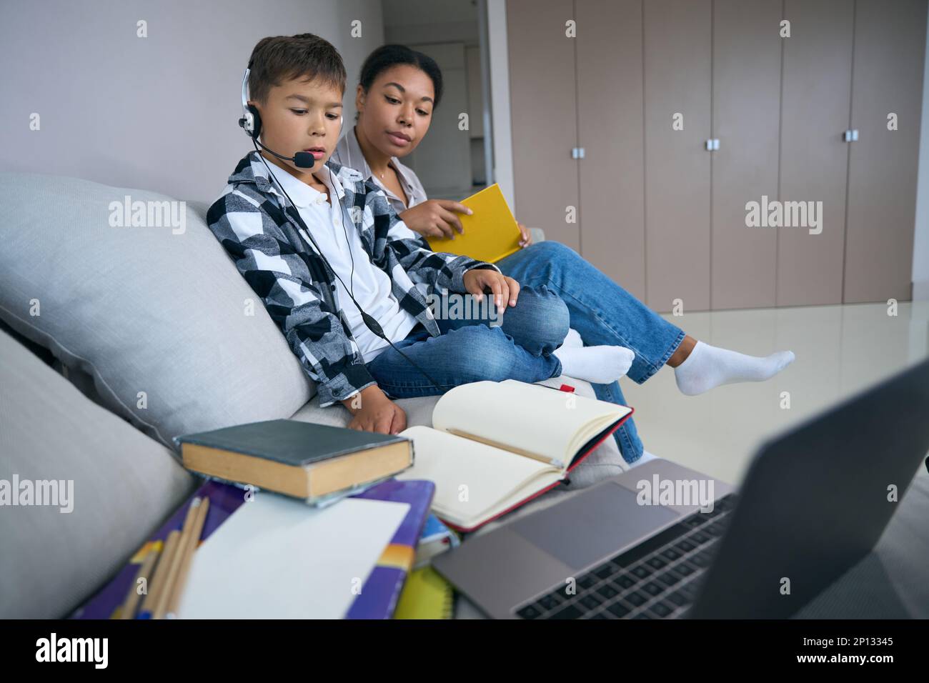 Teenager child on forced home online learning Stock Photo - Alamy