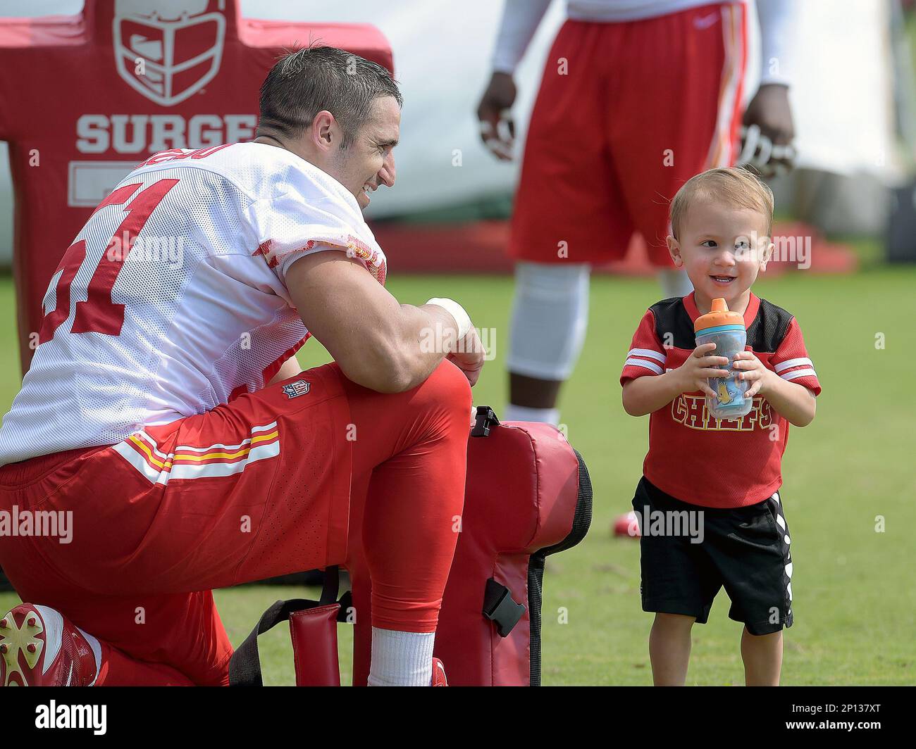 Kansas City Chiefs linebacker Frank Zombo plays with his son Brayden, 2 ...