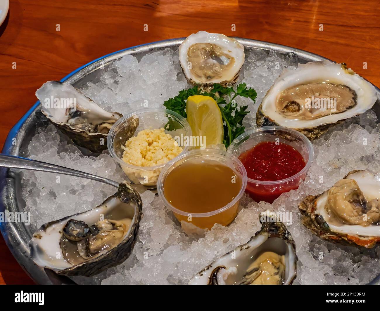 Half shell oyster hi-res stock photography and images - Alamy