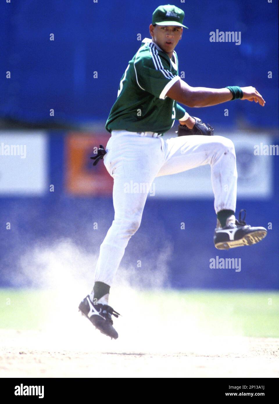 Teen shortstop Alex Rodriguez goes high to avoid a sliding runner at ...