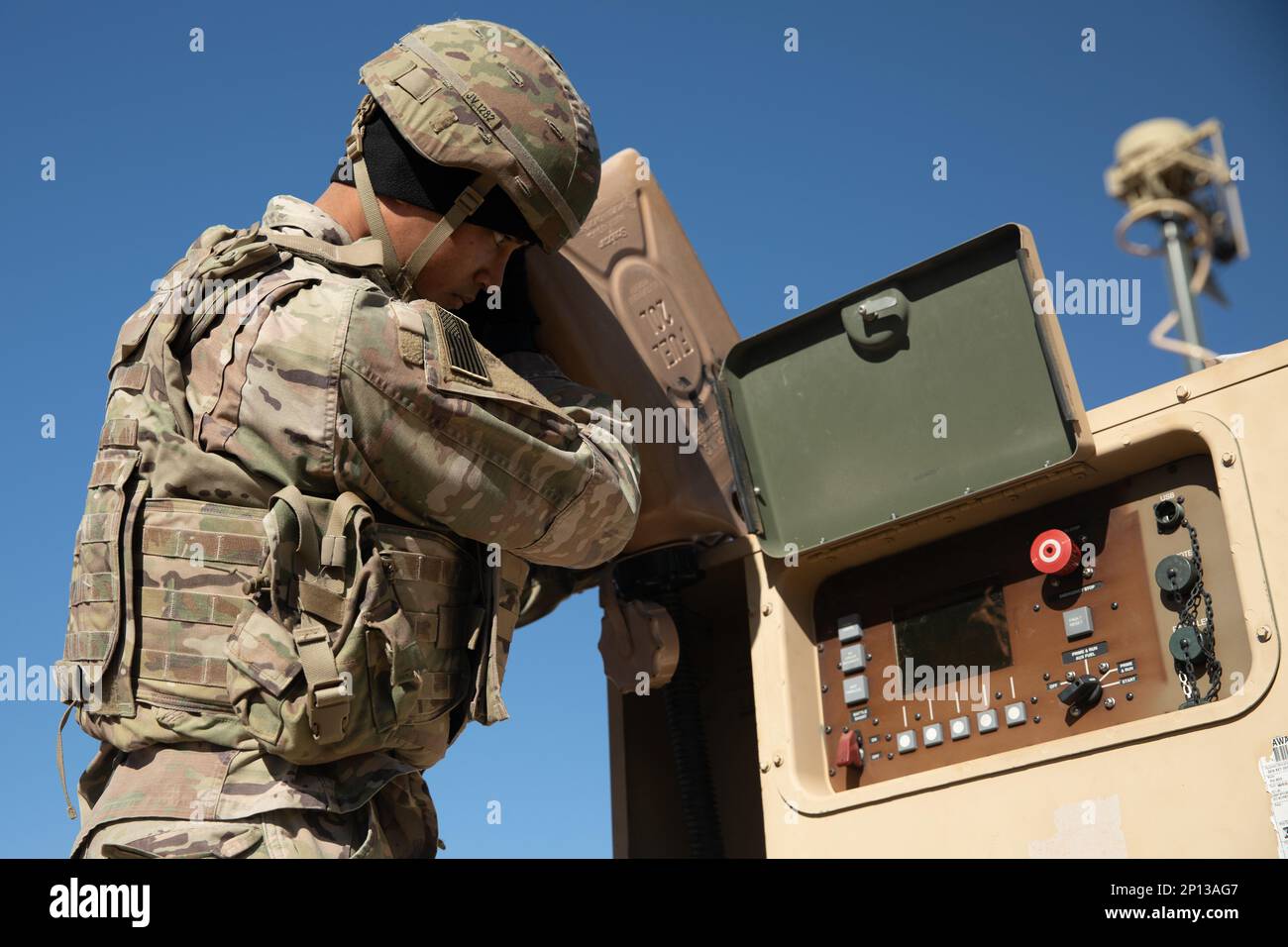 Spc. Jed Villamar with Headquarters and Support Company refuels a ...