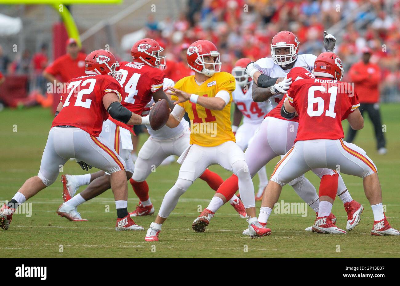 Kansas City Chiefs quarterback Alex Smith looks for an open player ...