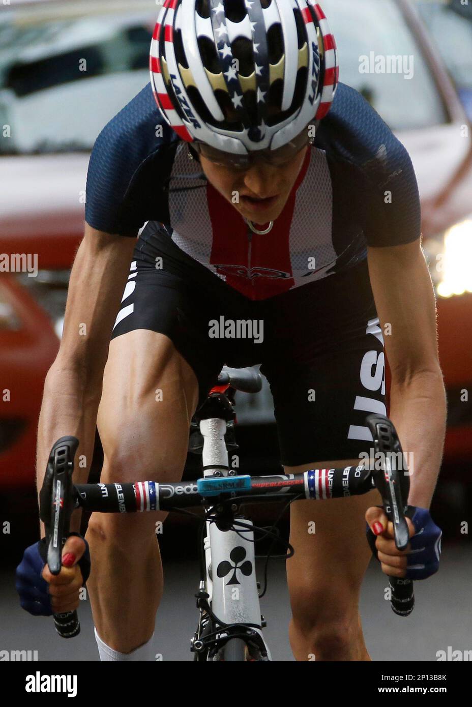 United States' cyclist Mara Abbott competes in the women's road race ...