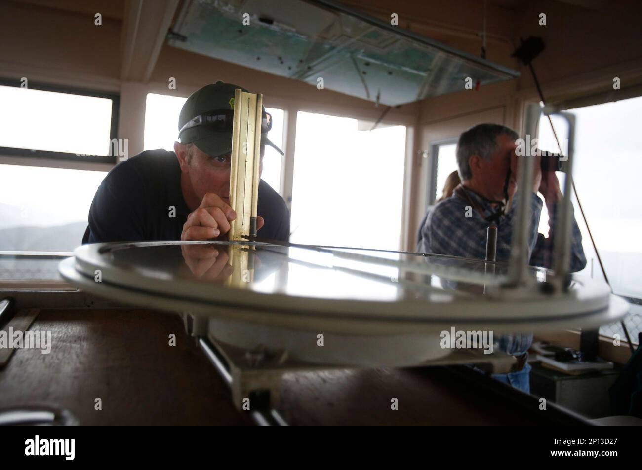 Fire Prevention Supervisor Matt Engbring looks for smoke through the ...