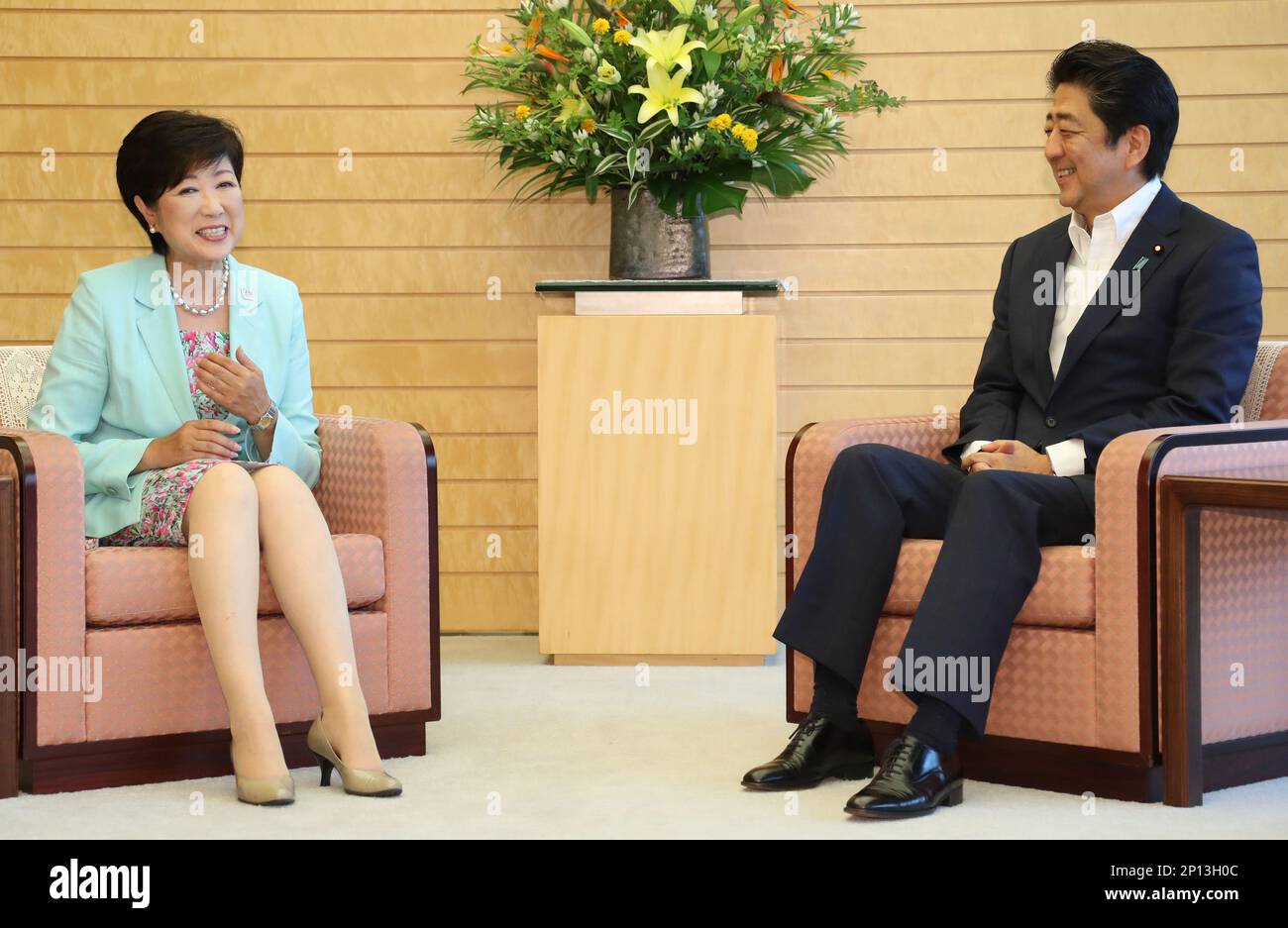 Tokyo Gov. Yuriko Koike, left, holds a meeting with Prime Minister ...