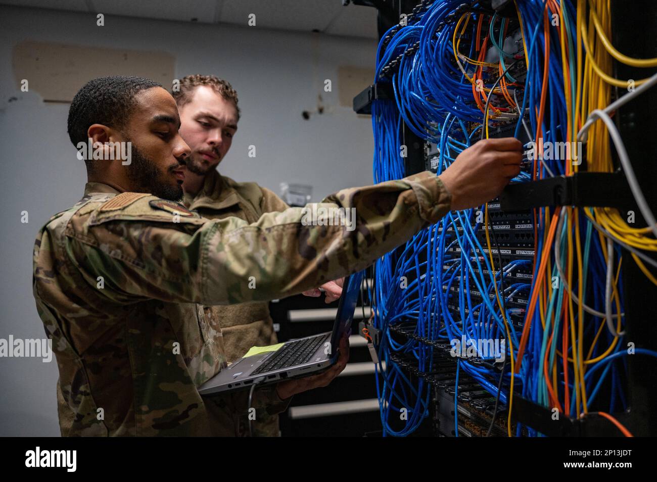 U.S. Air Force Airmen assigned to the 355th Communications Squadron troubleshoot the non ...