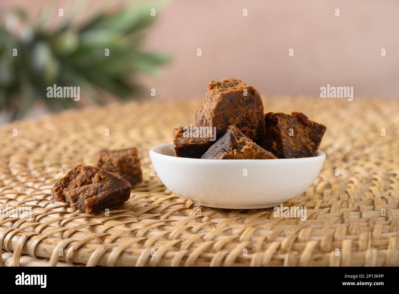 Kithul jaggery and treacle natural sweetener in white bowl on ...