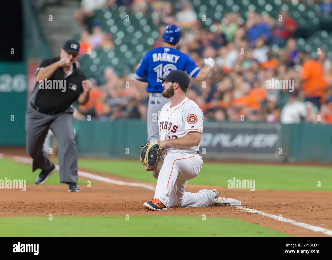 01 August 2016: First base Umpire Tony Randazzo (11) calls an out on ...