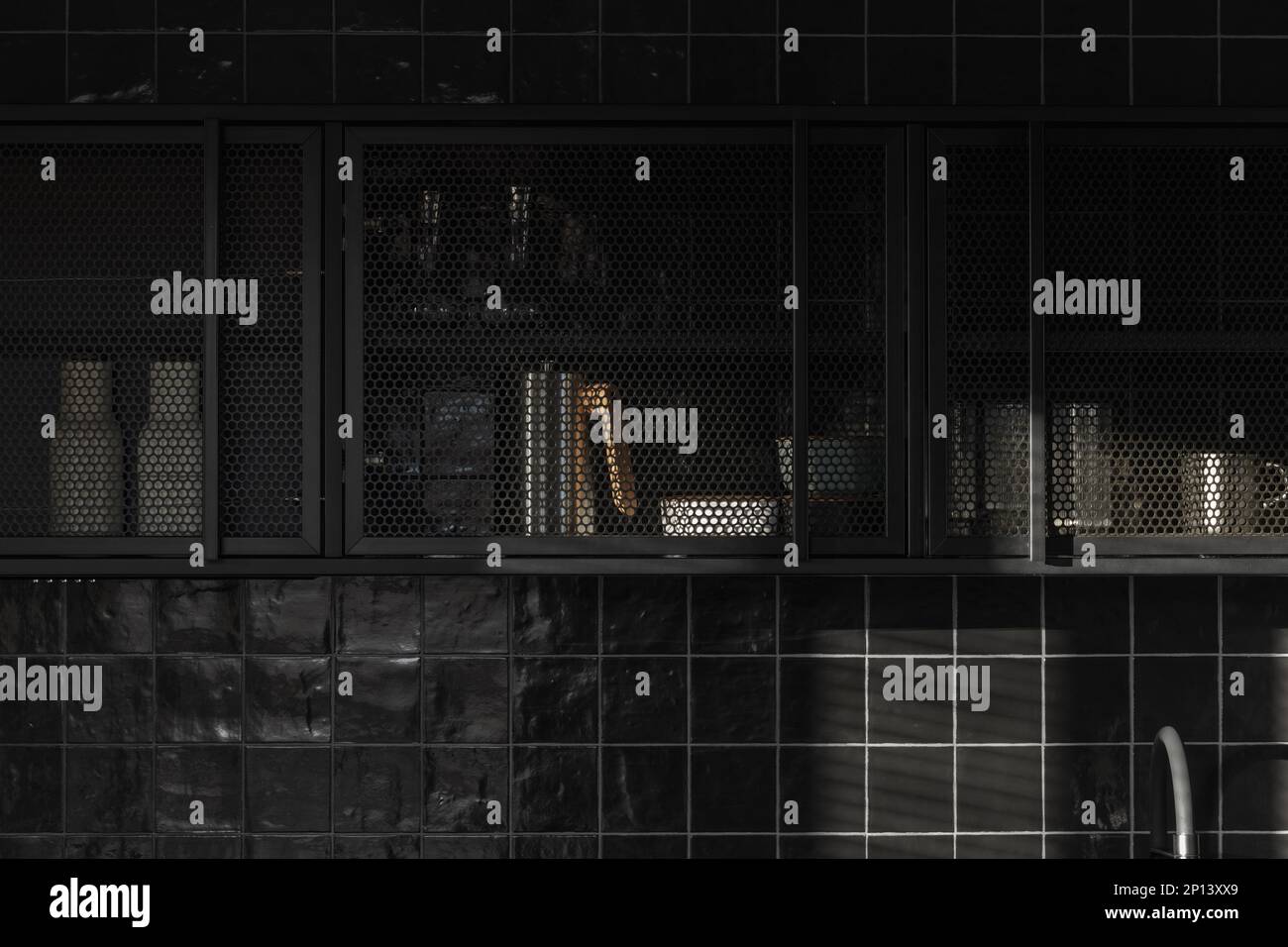 Small kitchen interior in grey and black colours, concrete wall design ...