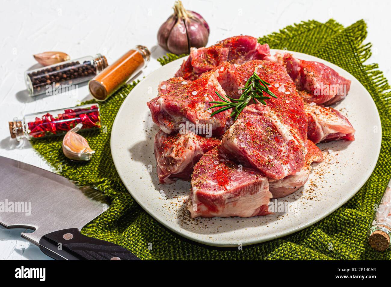 Raw pork loin pieces with ground spices. Fresh meat cut, ingredient for ...