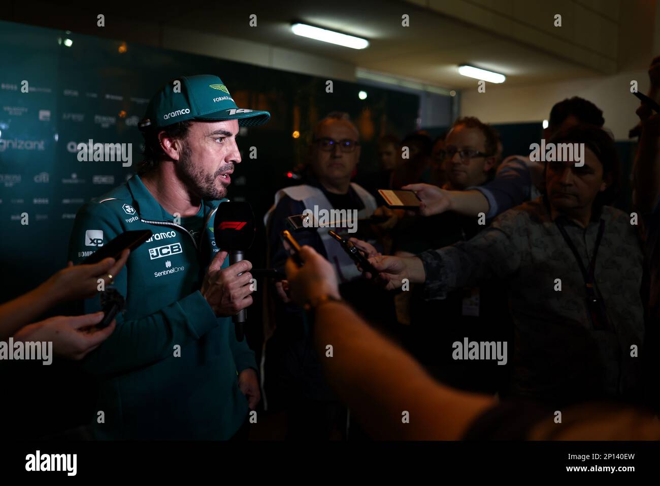Fernando Alonso (ESP) Aston Martin F1 Team with the media. Formula One ...