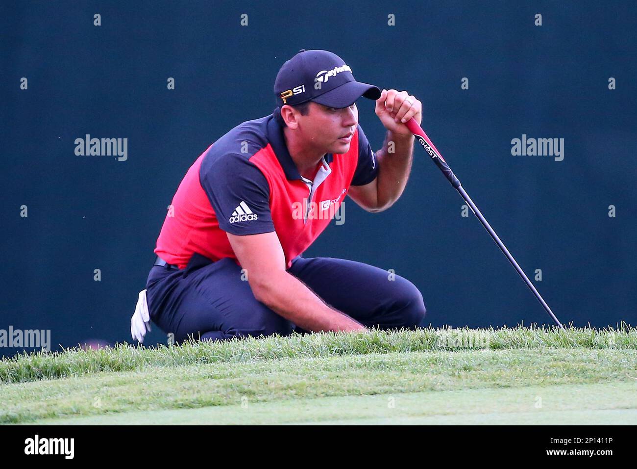 29 JUL 2016: Jason Day of Australia lines up his putt from off the 18th ...