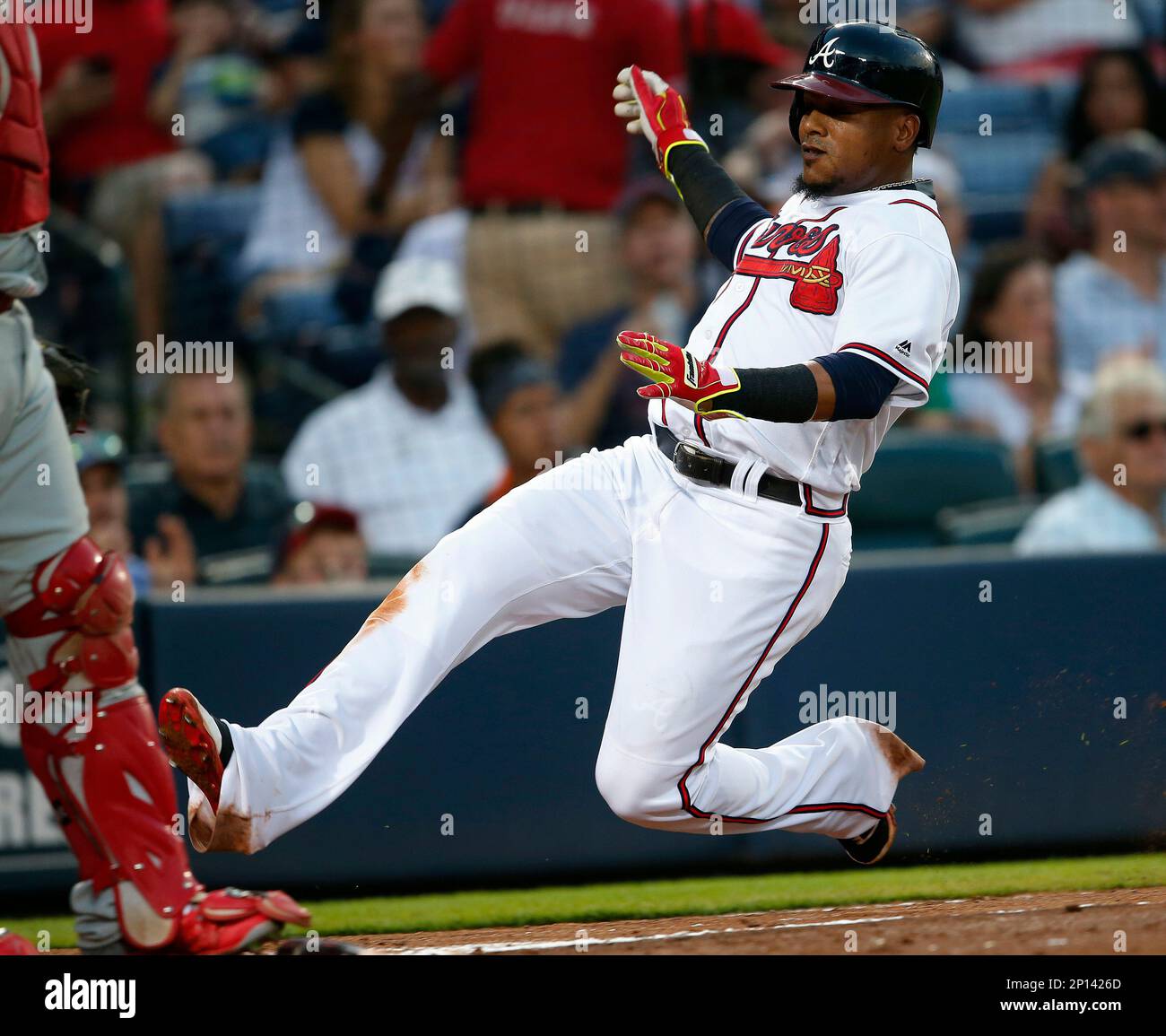 Atlanta Braves' Erick Aybar scores on a Gordon Beckham ground ball in ...