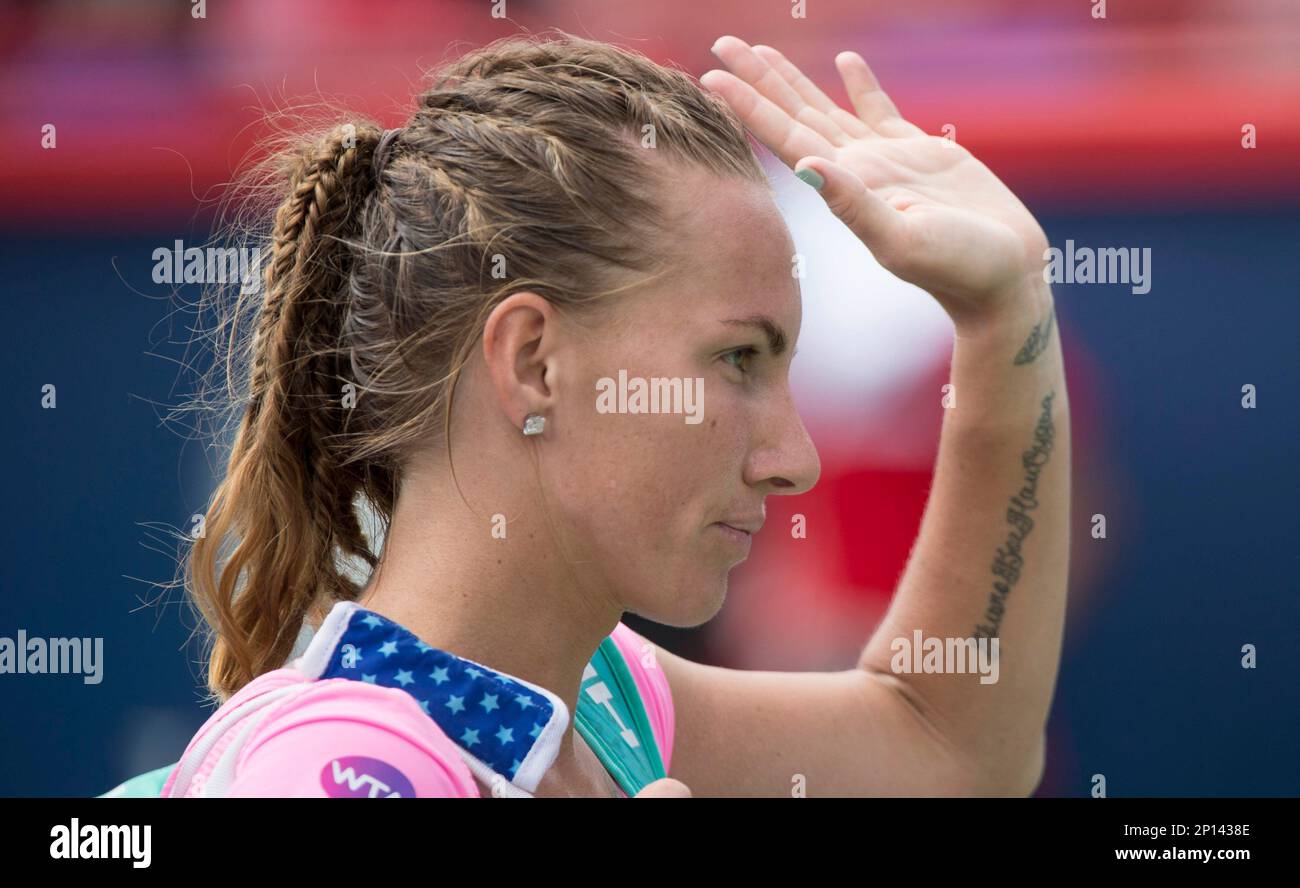 Svetlana Kuznetsova, of Russia, waves as she walks off the court ...