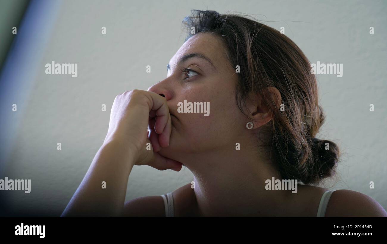 One pensive woman pondering dilemma. Close up face of person thinking ...