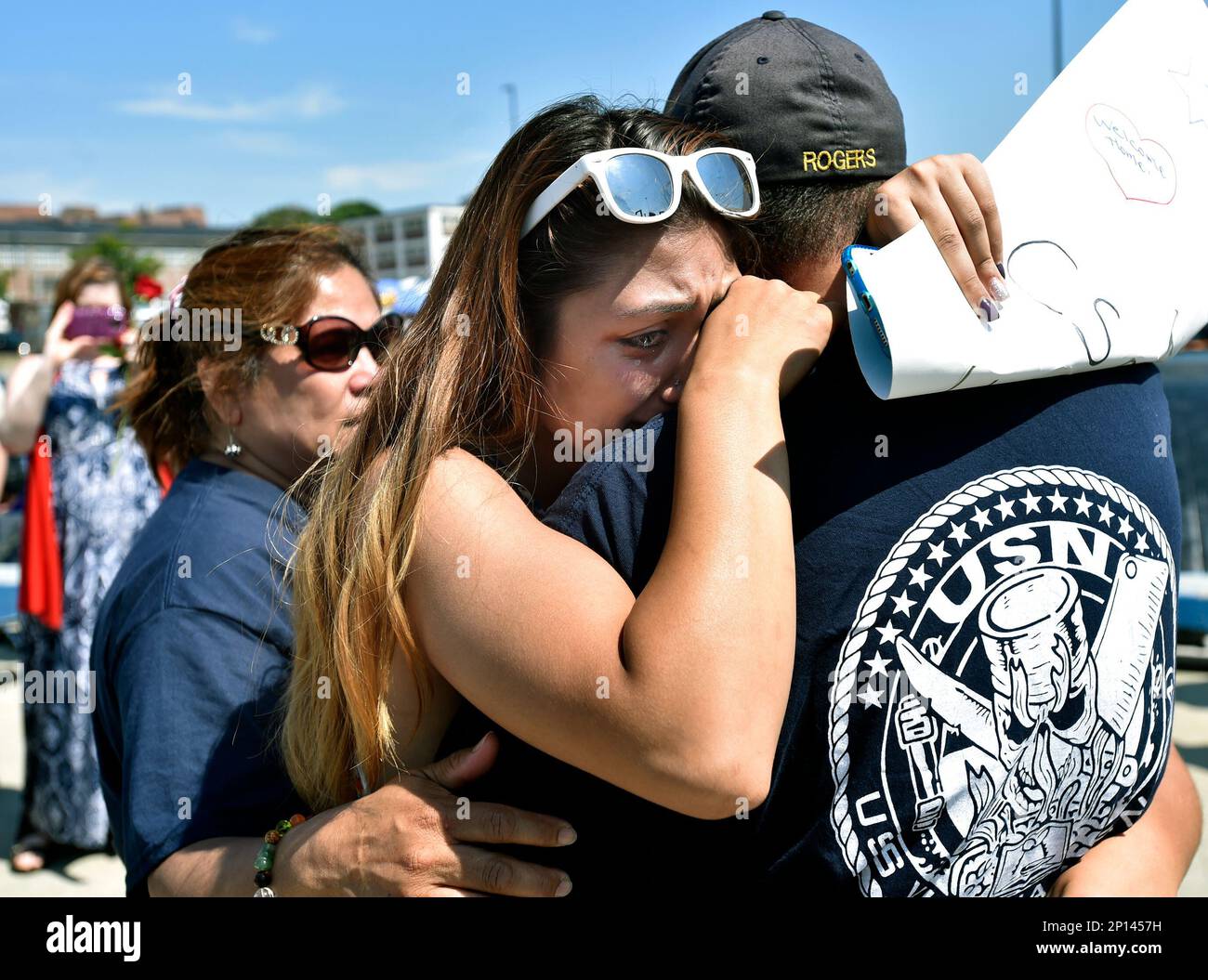 Erika Rogers hugs her brother Stephen Rogers, a U.S. Navy Culinary ...