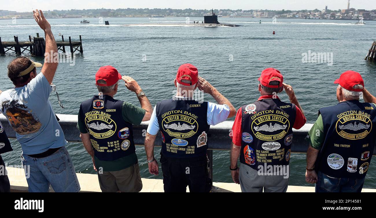 The U.S. Navy attack submarine USS Virginia (SSN 774) passes an honor ...