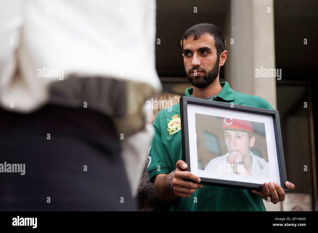 Nadeem Jeries holds a photo of Sammy Yatim, who he says was his best ...