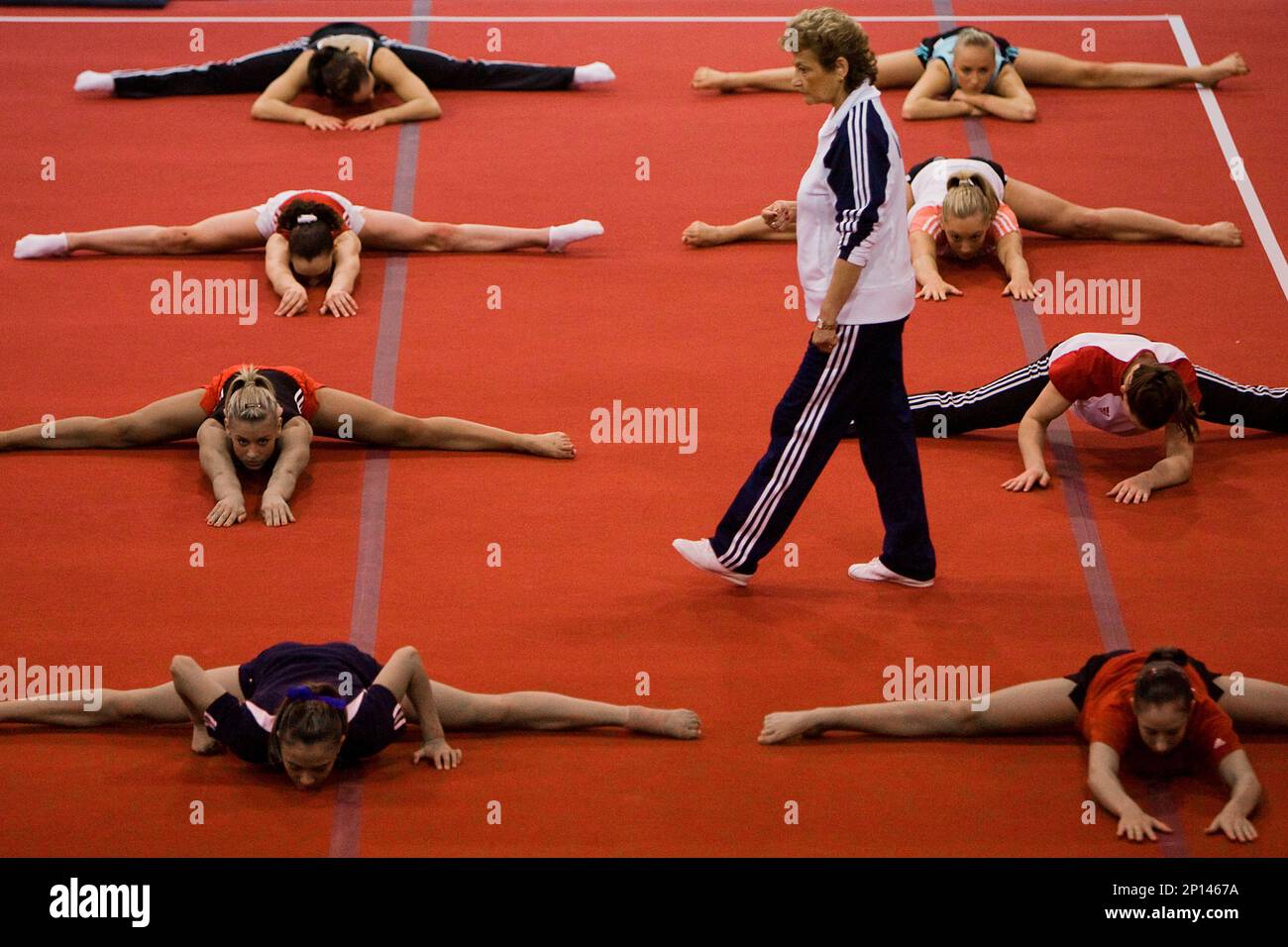 In this May 7, 2008, photo, Martha Karolyi watches as gymnasts stretch ...
