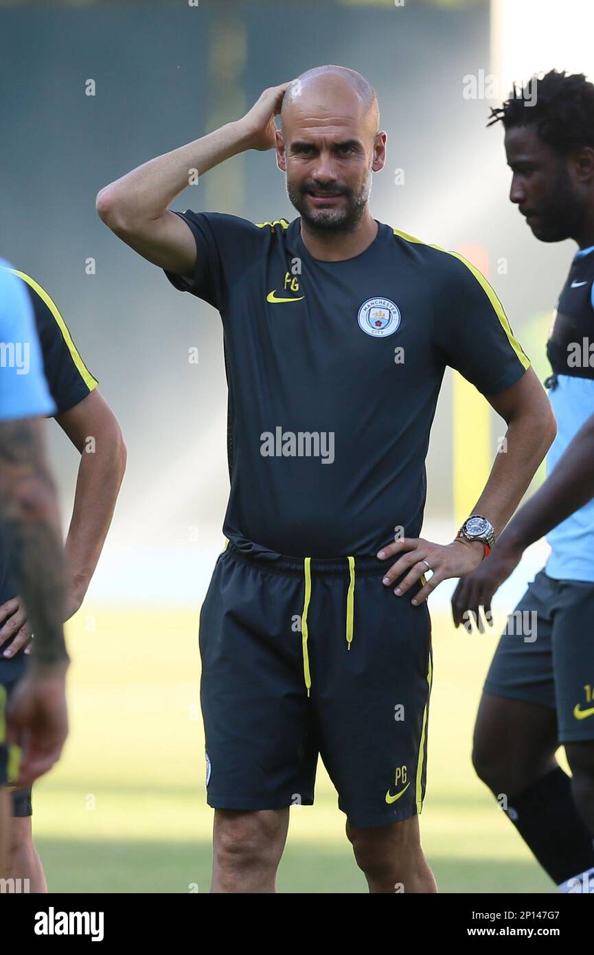 Head coach Pep Guardiola of Manchester City reacts as he takes part in ...