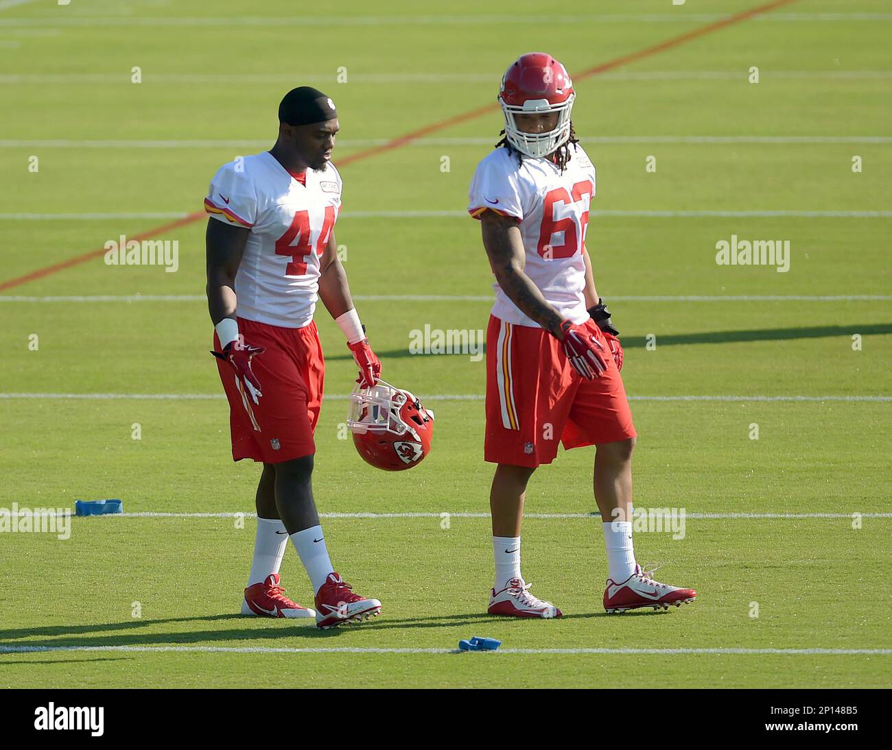 Kansas City Chiefs linebackers Tyrell Adams and Terrance Smith prepare ...