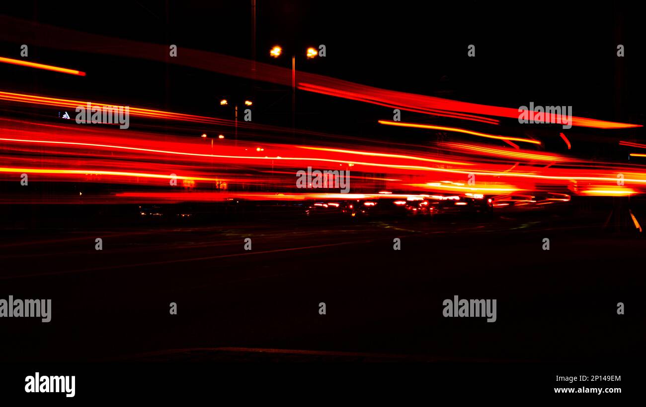 Lights of cars at night. Street line lights. Night highway city. Long ...