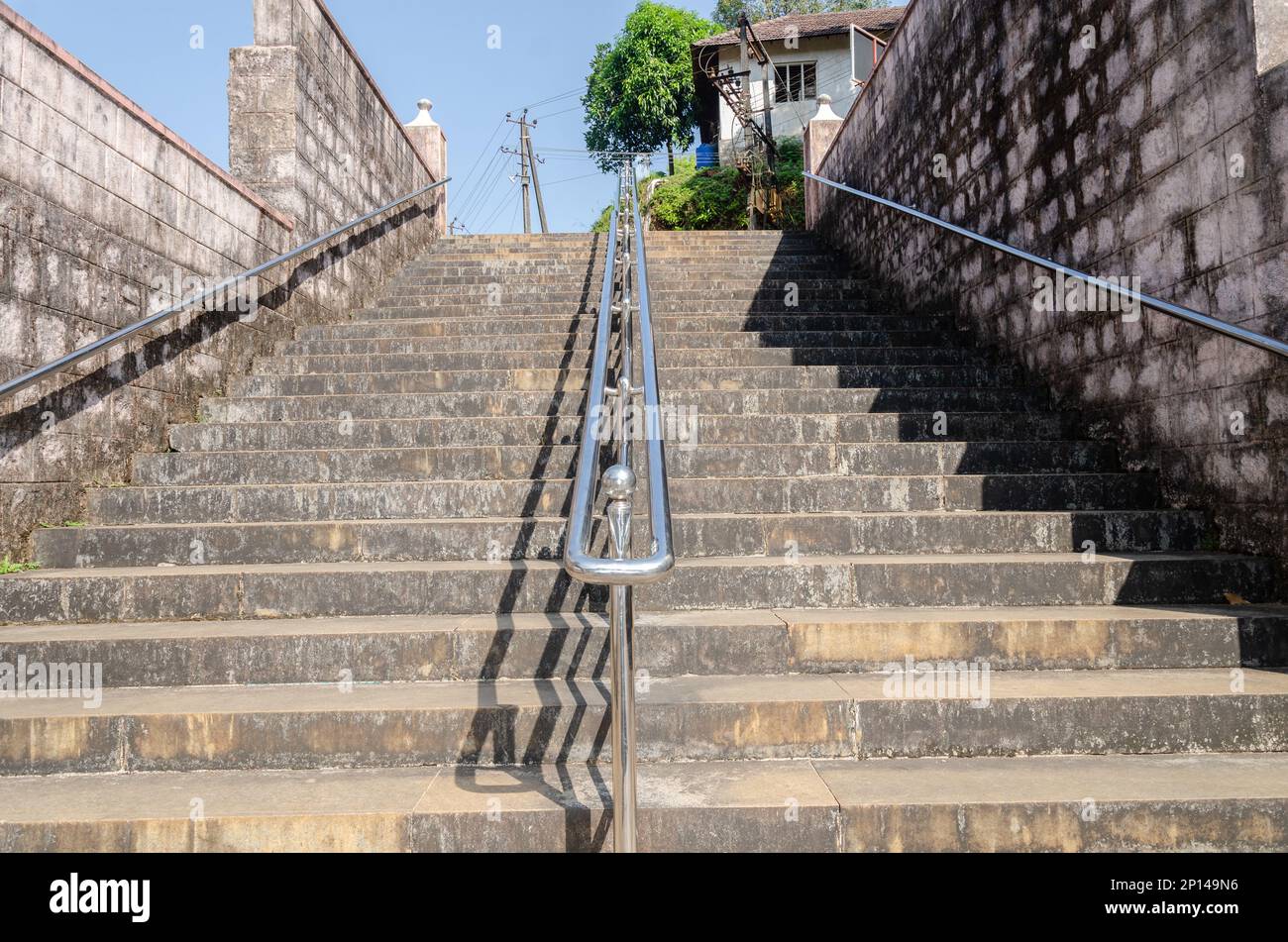 Stone steps with railings Stock Photo - Alamy
