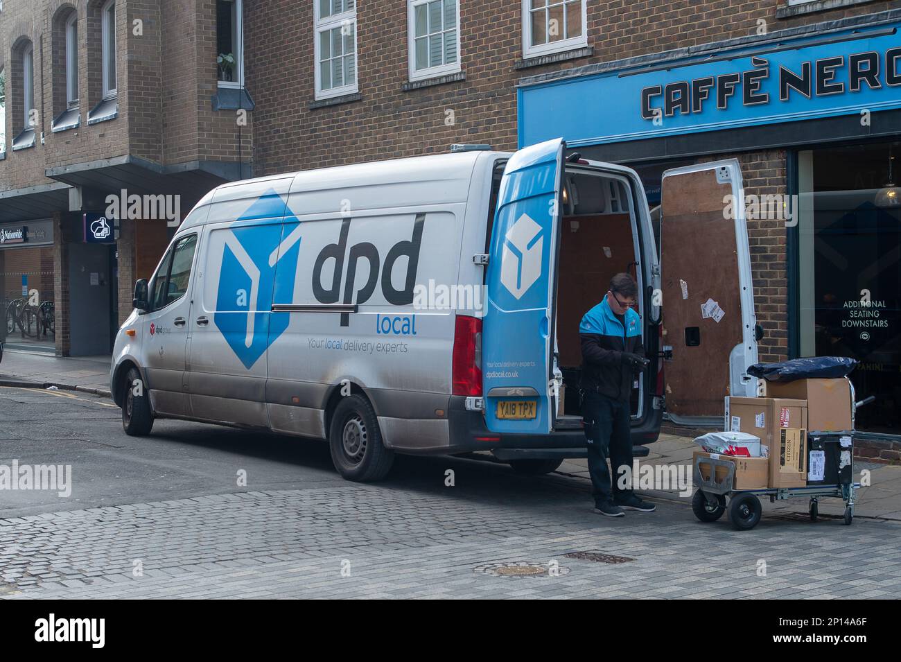 Delivery deliveries delivering van vans driver drivers hi-res stock ...