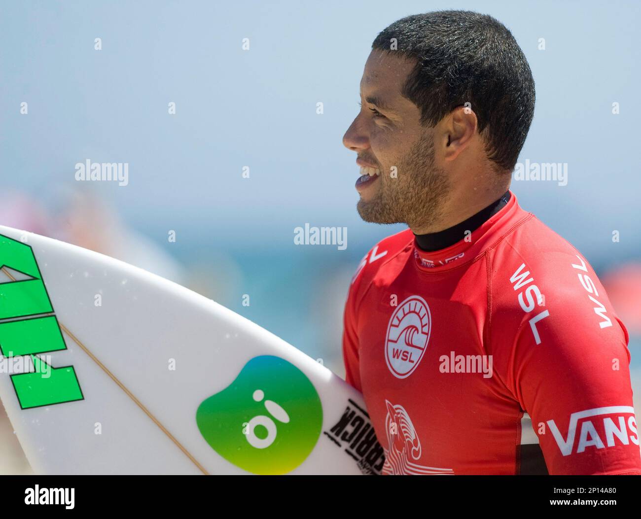 World champion surfer Adriano De Souza is all smiles after taking first ...