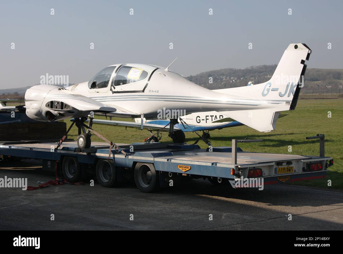 A Diamond DA-42 NG Twin Star being transported from Brighton City ...