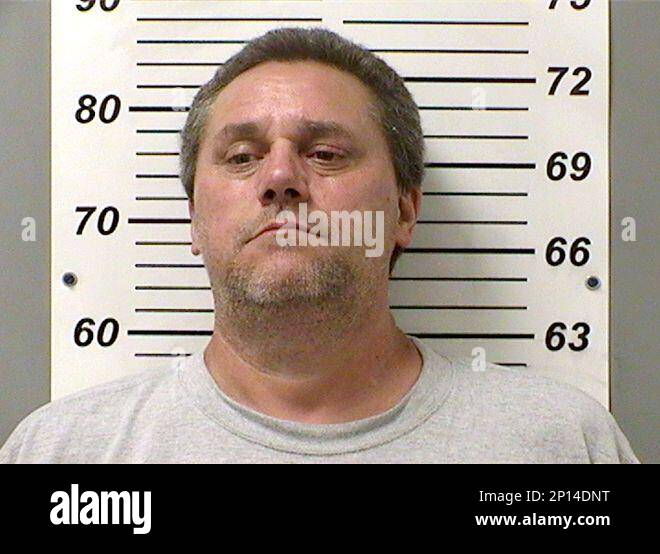 This undated booking photo provided by the Fulton County Sheriff's ...