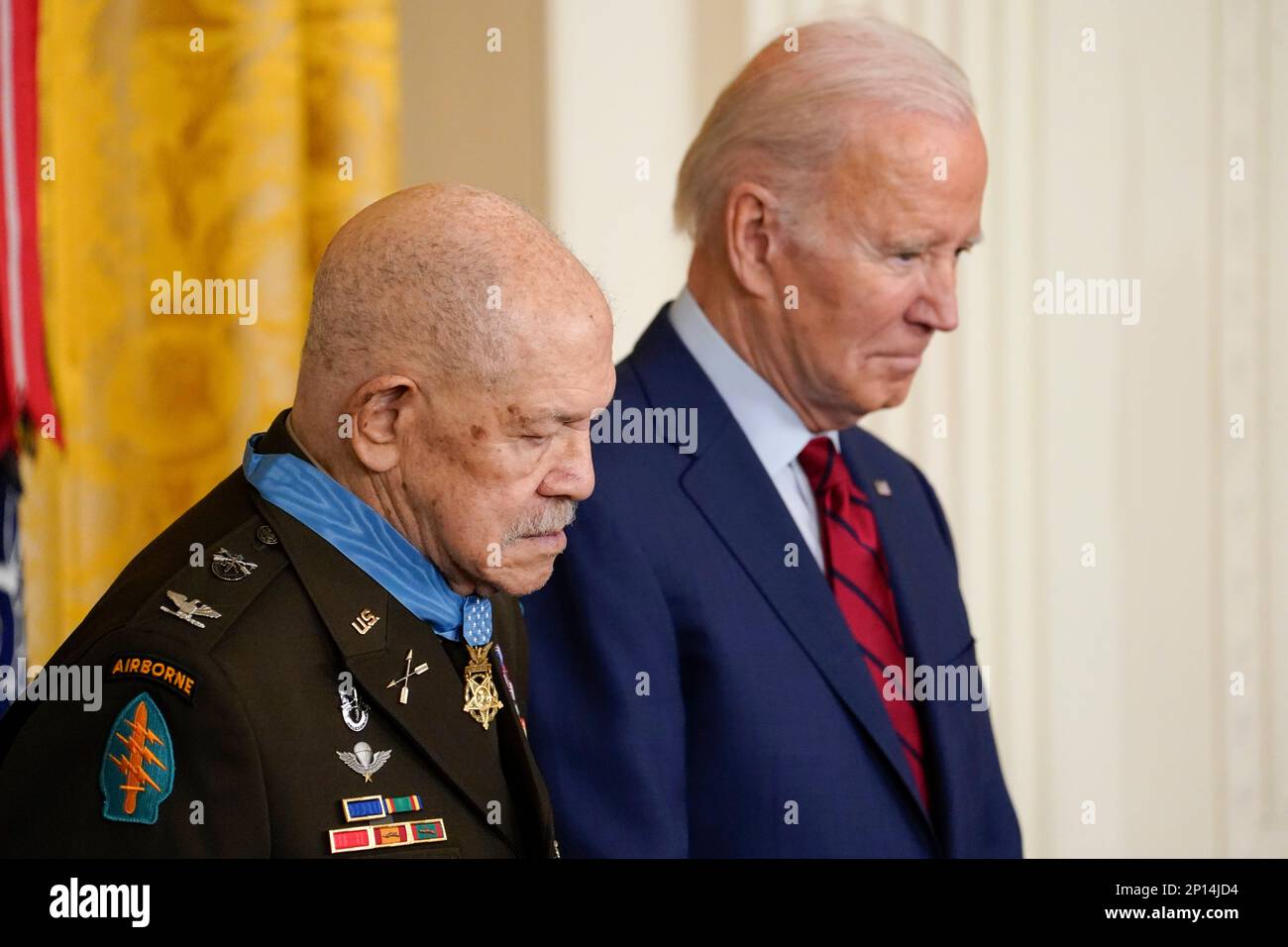 President Joe Biden stands with retired Army Col. Paris Davis after ...