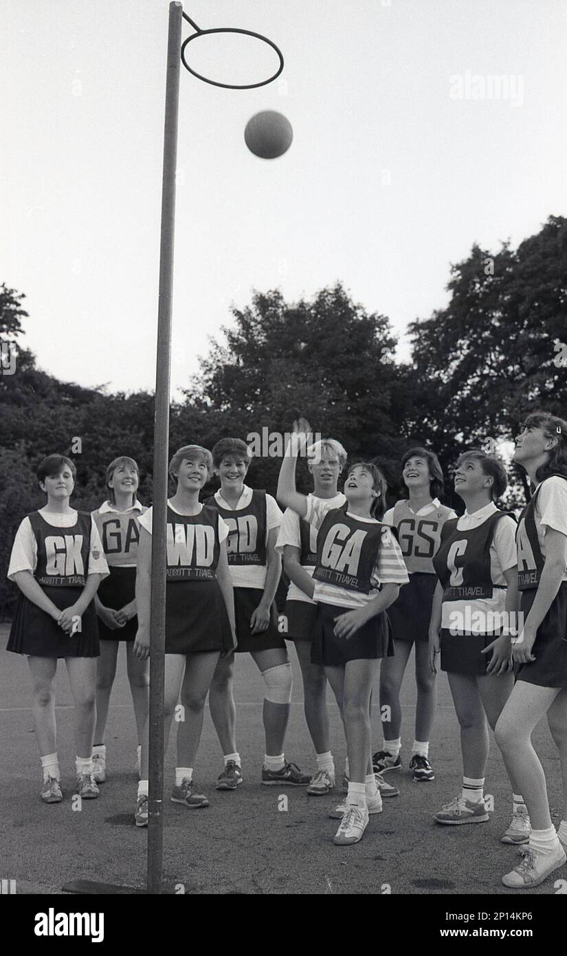 1989, netball, a schoolgirls team, with letters on their vests ...