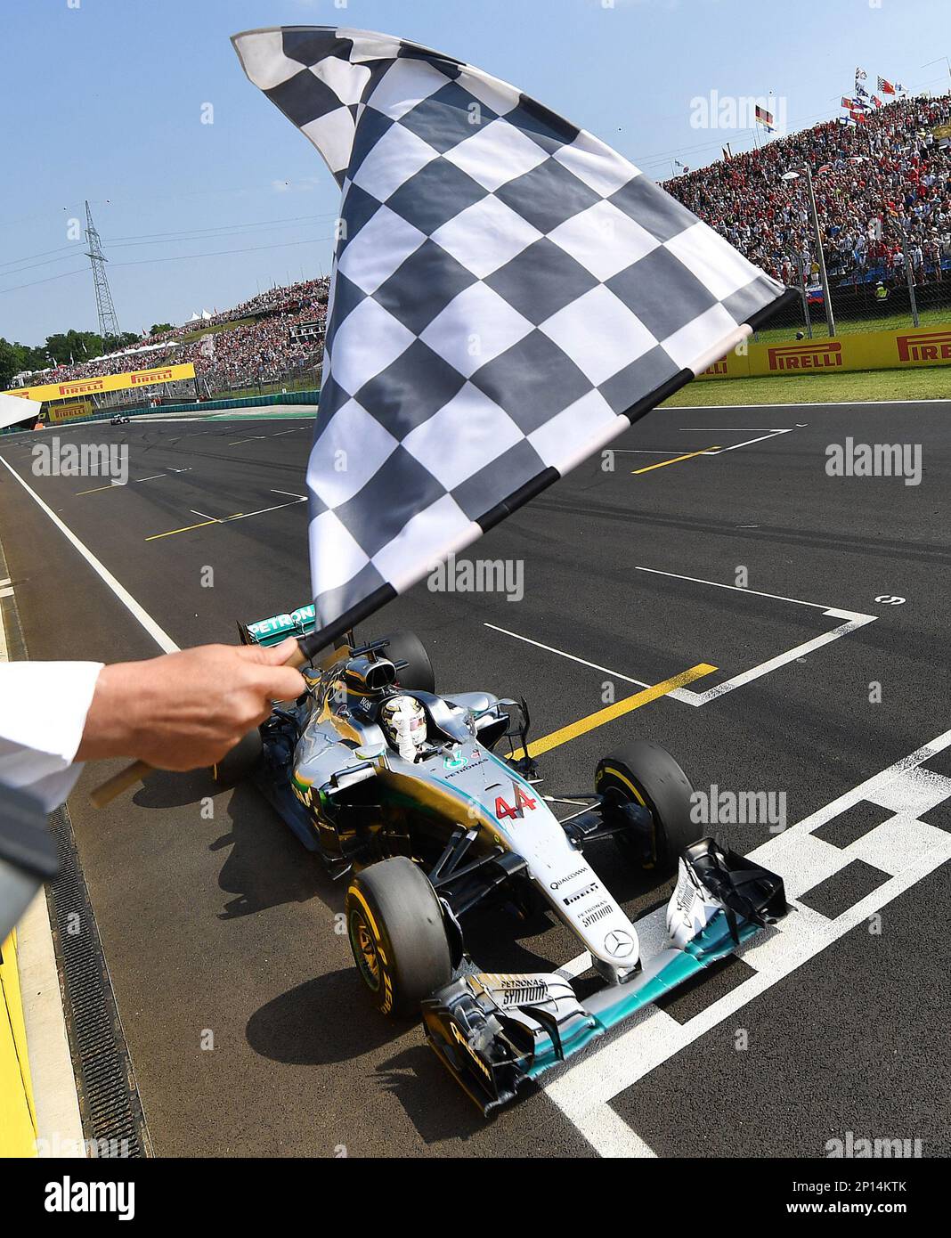 Mercedes AMG Petronas F1 Team's British driver Lewis Hamilton crosses ...