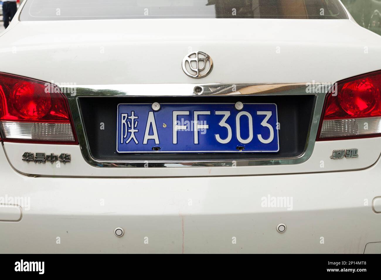 Boot, or trunk in American English, with badge of car maker logo on car ...
