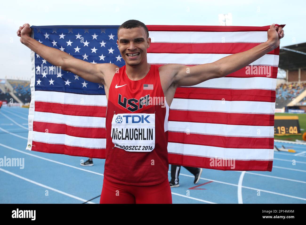 Taylor McLaughlin (USA) poses with United States flag after placing ...