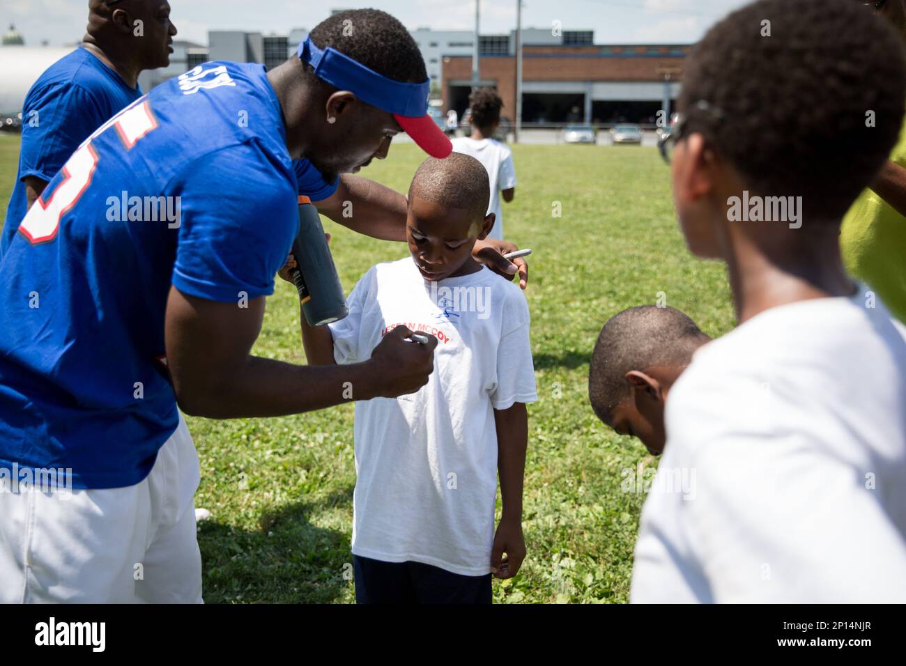 NFL running back and Harrisburg native LeSean McCoy signs a participant ...